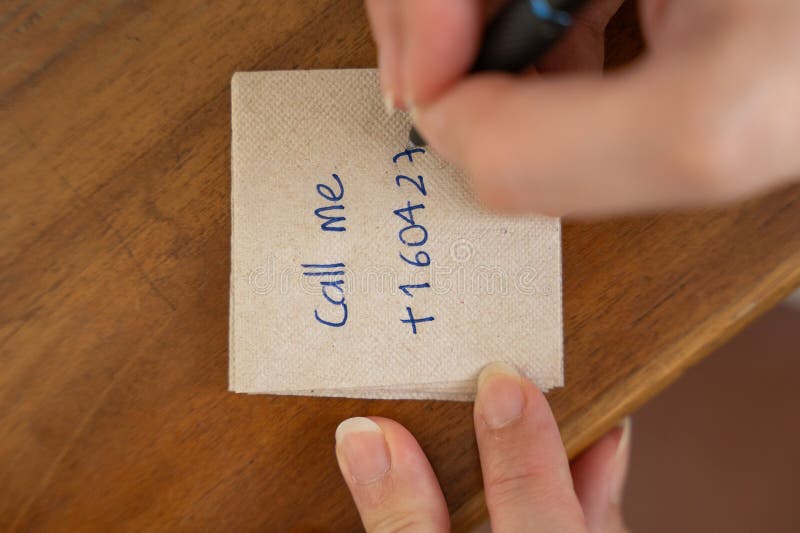 Meeting Strangers: Offering a Phone Number Stock Photo - Image of ...