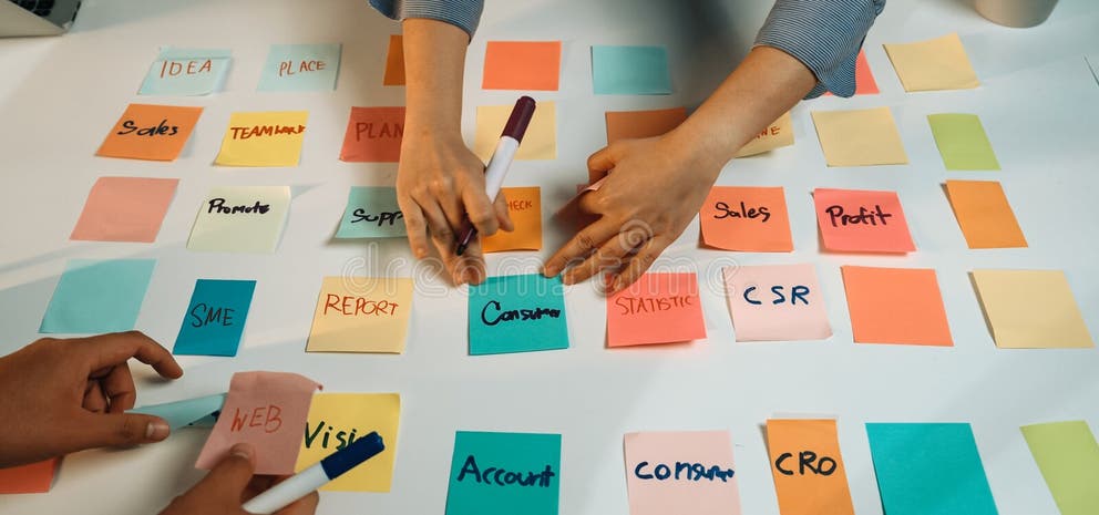 Colorful Sticky Notes Display on Table for Team Brainstorming Session ...