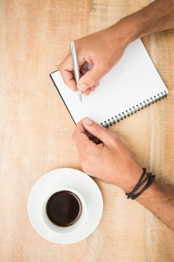 Hands writing on notepad stock photo. Image of professional - 58188628