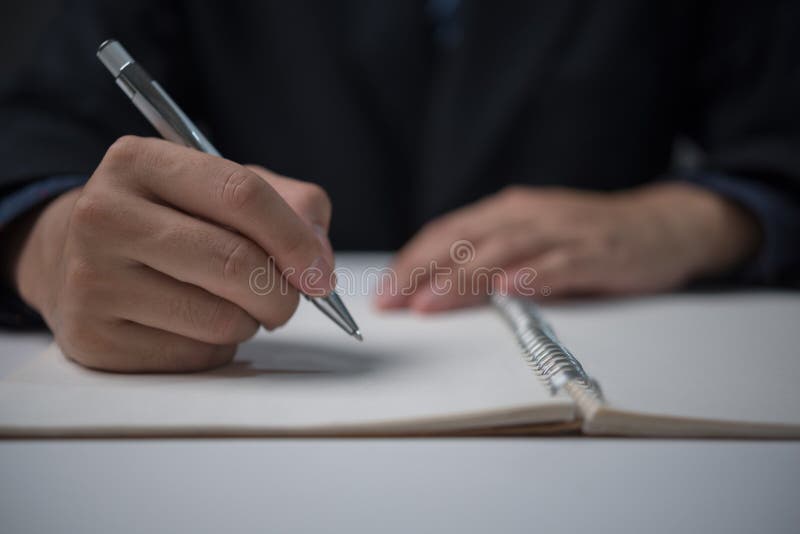 Hands Writing with Pen on Notebook. Concept of Work, Study, and ...