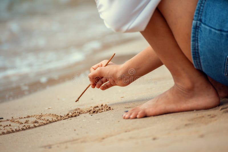 Hands Writing on Sand and Water Flow Stock Image - Image of romance ...