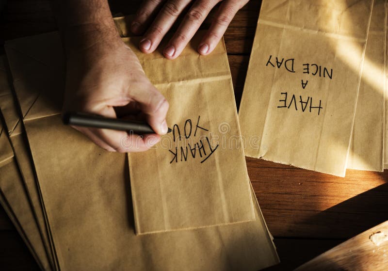 Hands Writing Thankful Words on Paper Bags Stock Photo - Image of words ...