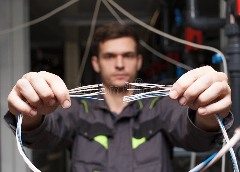 Hands of Young Electrician. Stock Image - Image of bared, close: 83228133