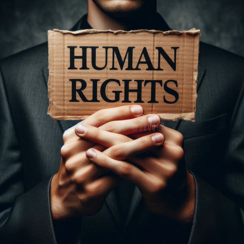 Hands of a Young Man Holding Human Rights Sign, Dramatic Closeup with ...