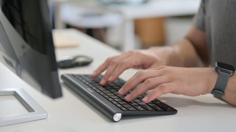 Hands of Young Man Typing on Keyboard, Close Up Stock Photo - Image of ...