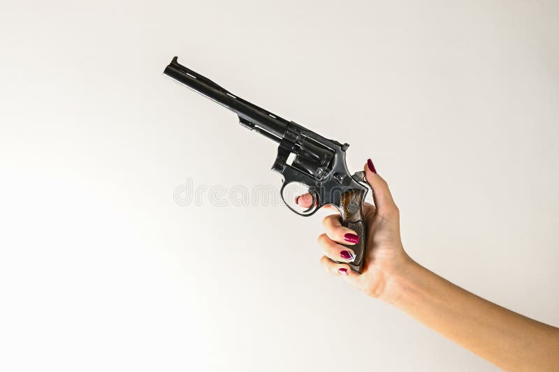 Hands of a Young Woman Holding a Gun, White Background. Stock Image ...