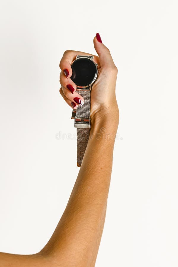 Hands of a Young Woman Holding a Watch, White Background. Stock Photo ...