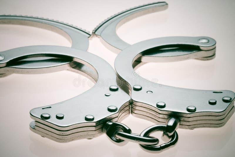 Handschellen stockfoto. Bild von schleife, verriegelung - 1420648