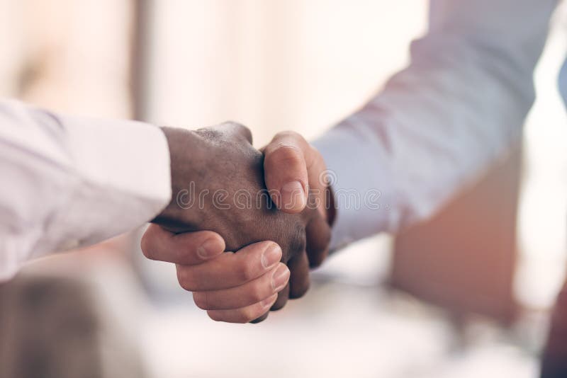 Handshake between African and a Caucasian Man Stock Image - Image of ...