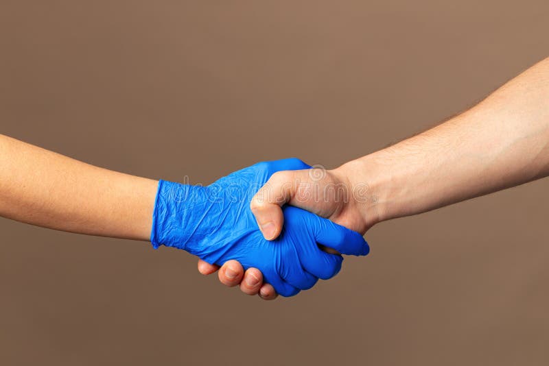 Handshake in a Blue Gloves, Help Concept. Personal Hygiene during a ...