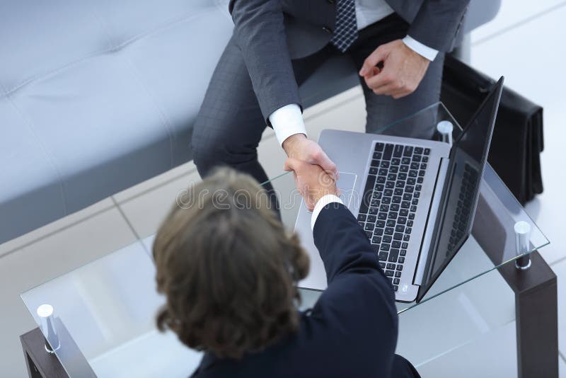 Handshake of Business Partners Above the Desk. Stock Photo - Image of ...