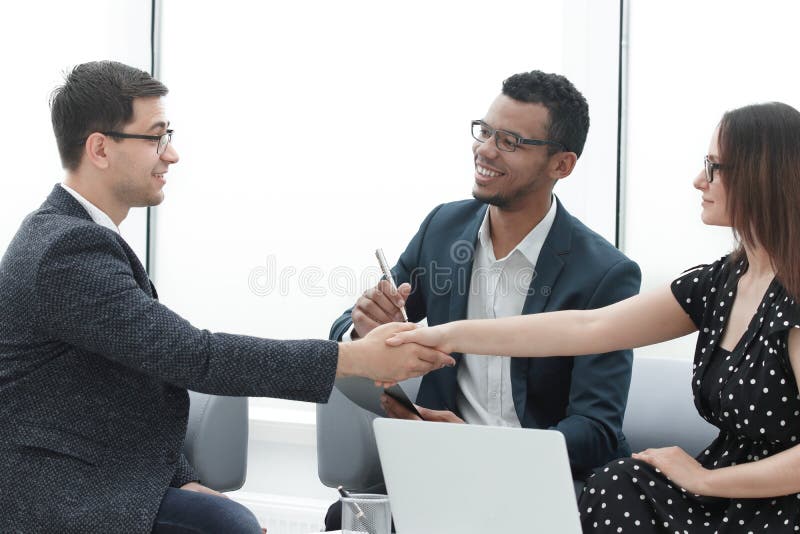 Handshake of Business Partners after Discussing a New Joint Project ...