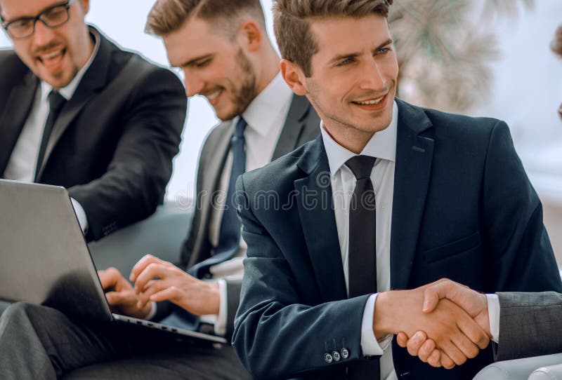 Handshake Business People in the Office Waiting Room Stock Photo ...