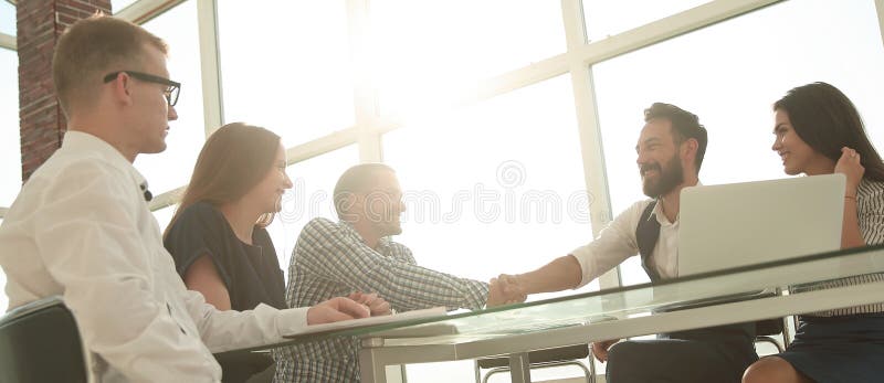 Handshake Business People Over the Desk in the Office Stock Photo ...