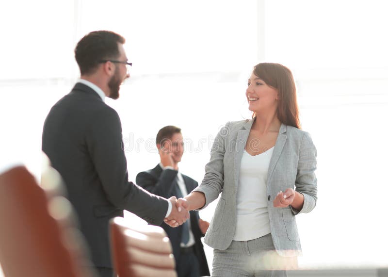 Handshake between Colleagues in the Workplace Stock Image - Image of ...