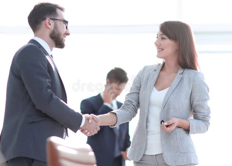 Handshake between Colleagues in the Workplace Stock Photo - Image of ...
