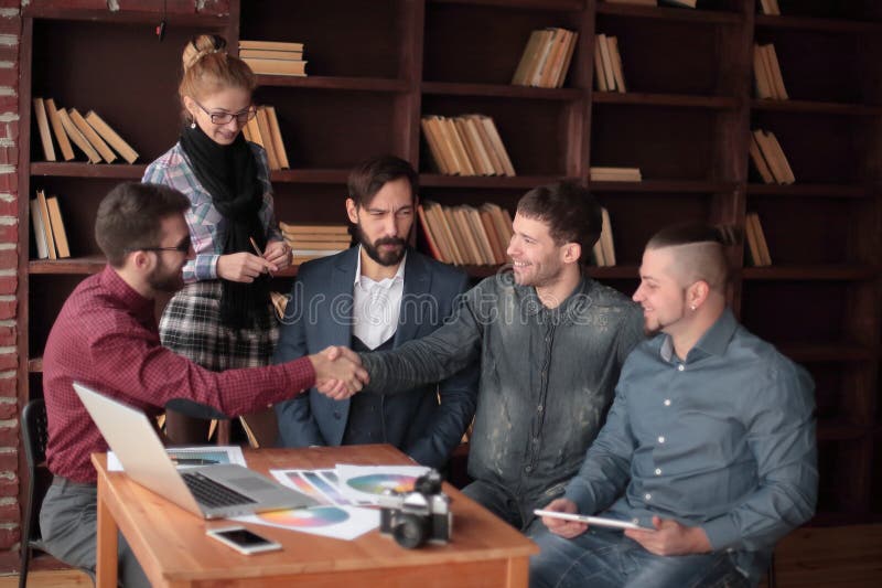 Handshake of Creative Partners in the Design Studio Stock Photo - Image ...