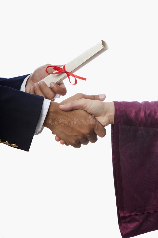 Handshake and a diploma stock image. Image of college - 14499281