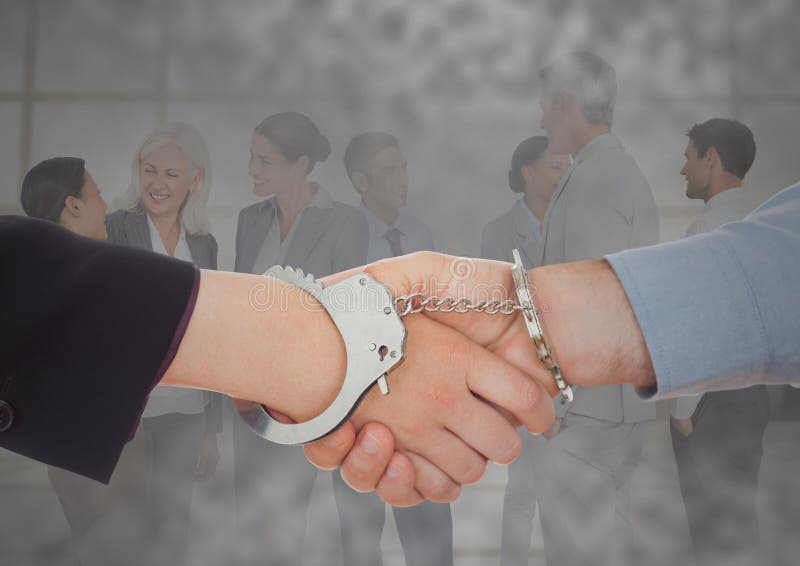 Handshake with Handcuffs in Front of Business People with Grunge ...