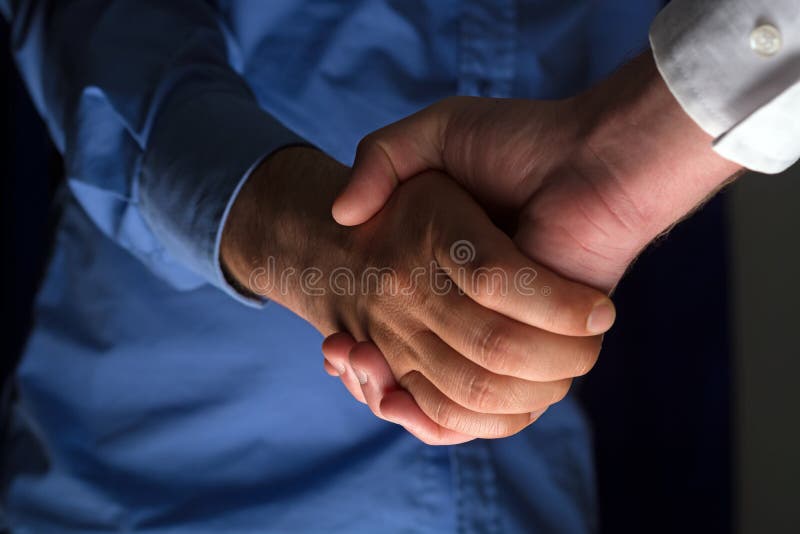 Handshake Handshaking in Dark with Low Light Stock Photo - Image of ...
