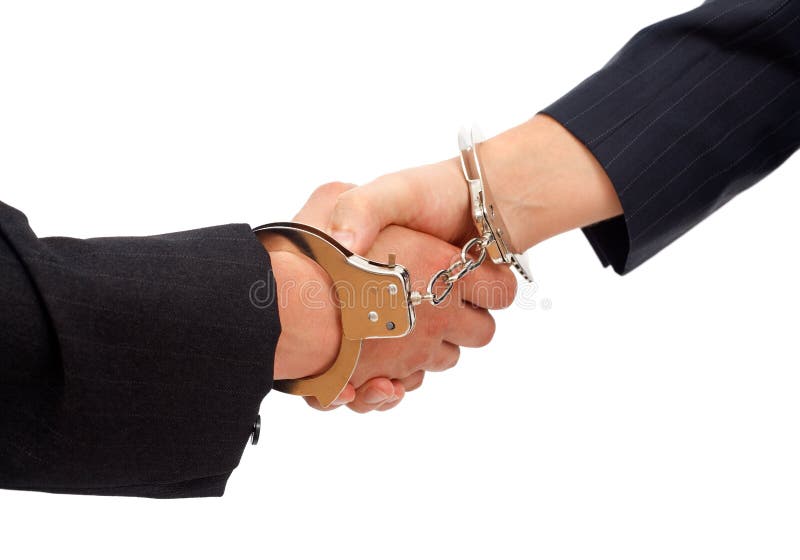 Handshake Linked with Handcuffs Stock Photo - Image of chains ...