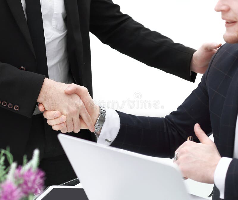 Handshake Manager and Client, Near the Table in the Office.photo with ...