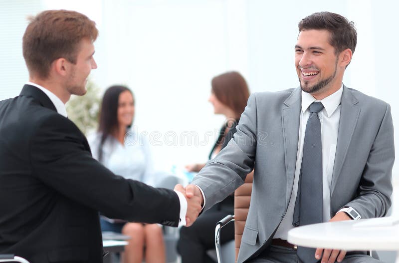 Handshake Manager and the Client in the Office. Stock Image - Image of ...