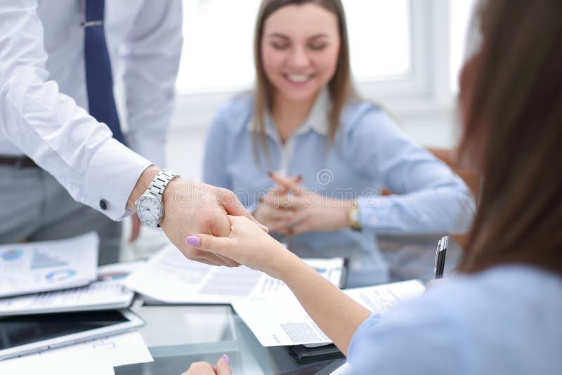 Handshake Manager and Client Over the Desk in the Office Stock Photo ...