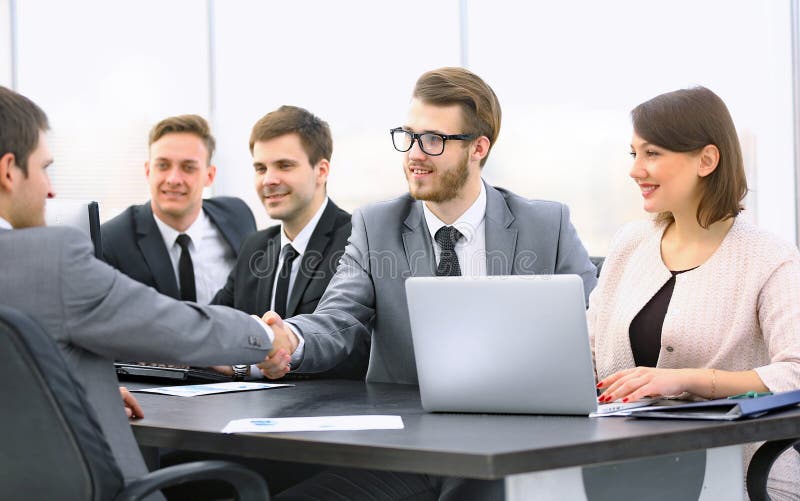 Handshake of a Manager and a Customer at the Desk Stock Image - Image ...