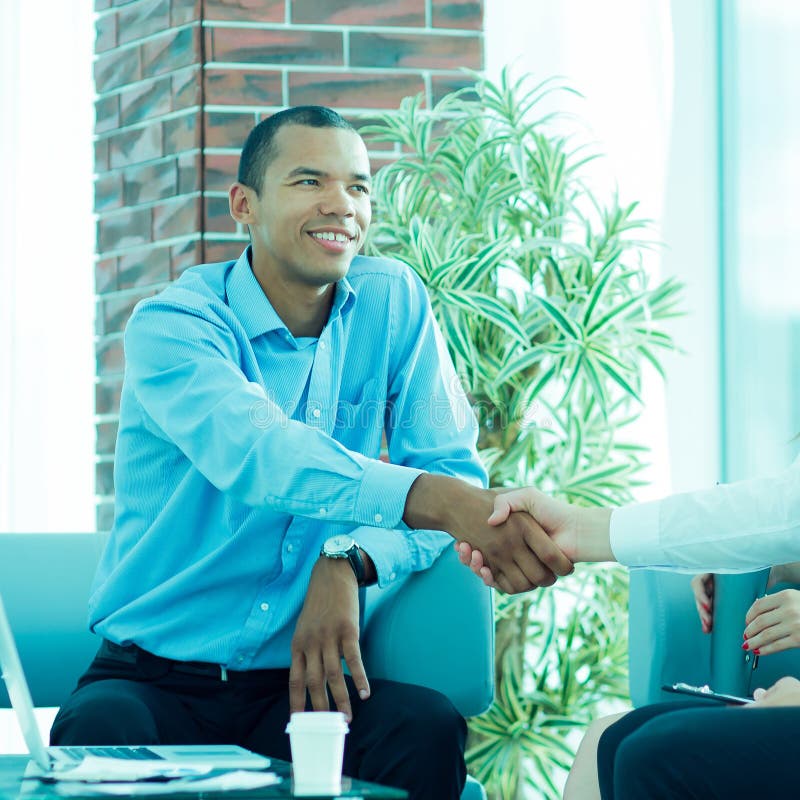 Handshake Manager and Customer in a Modern Office Stock Photo - Image ...
