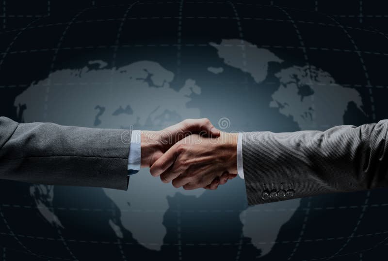 Handshake with Map of the World in Background Stock Image - Image of ...
