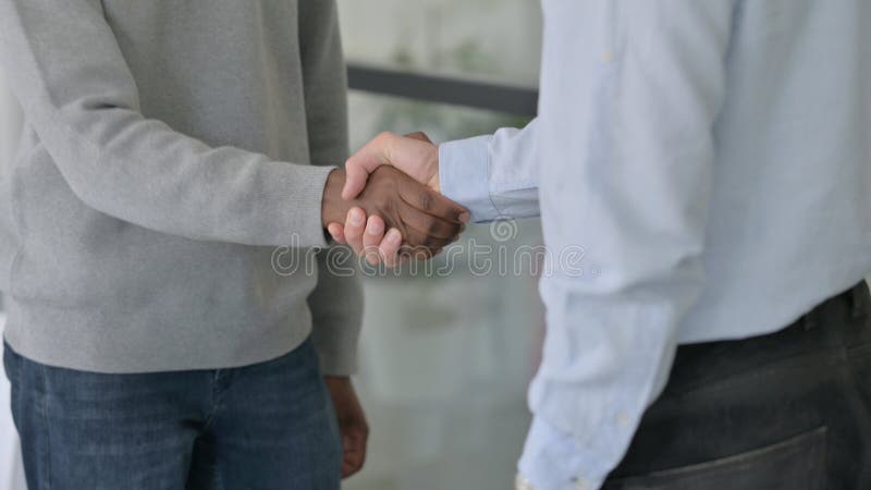Close Up of Handshake between Mixed Race Businessmen Stock Image ...