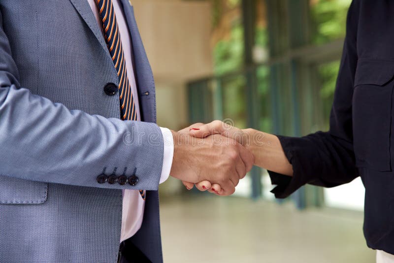 Handshake in the office stock photo. Image of professional - 163117258