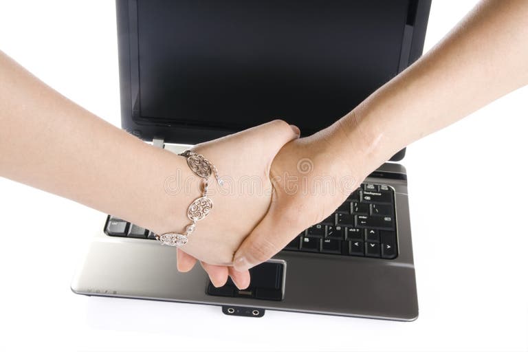 Handshake over laptop stock photo. Image of computer, businesswoman ...