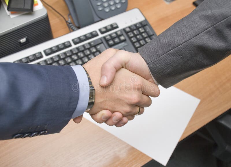Sealing a Business Transaction with a Handshake Stock Photo - Image of ...