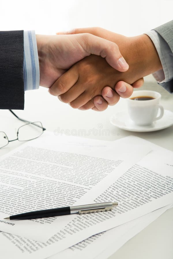 1+ Handshake over paper coffee Free Stock Photos - StockFreeImages