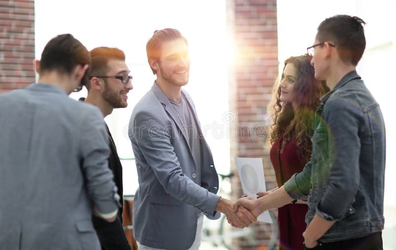 Handshake Partners in the Creative Office. Stock Photo - Image of ...