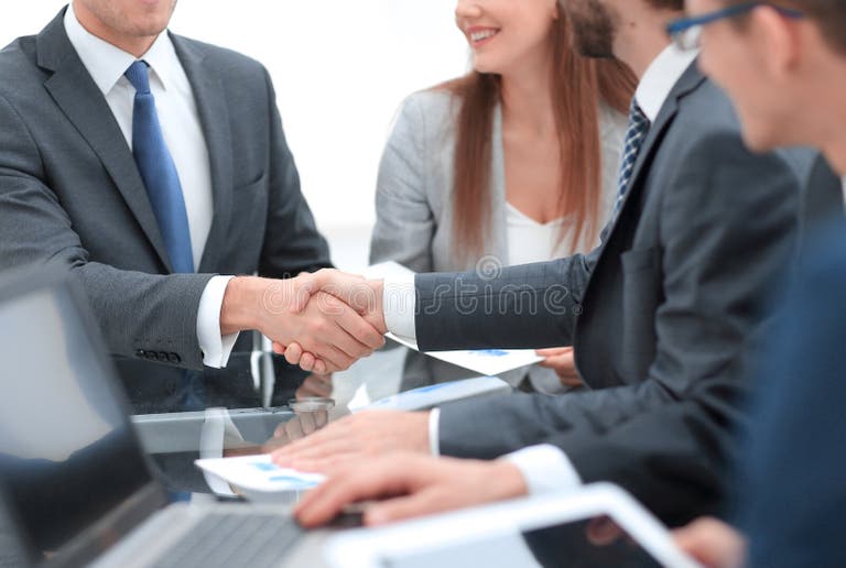 Handshake Partners at the Desk Stock Photo - Image of consultant ...