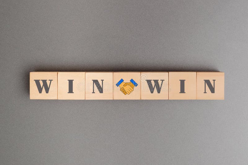 Handshake Partnership Agreement and Win Win Situation on Wooden Block ...