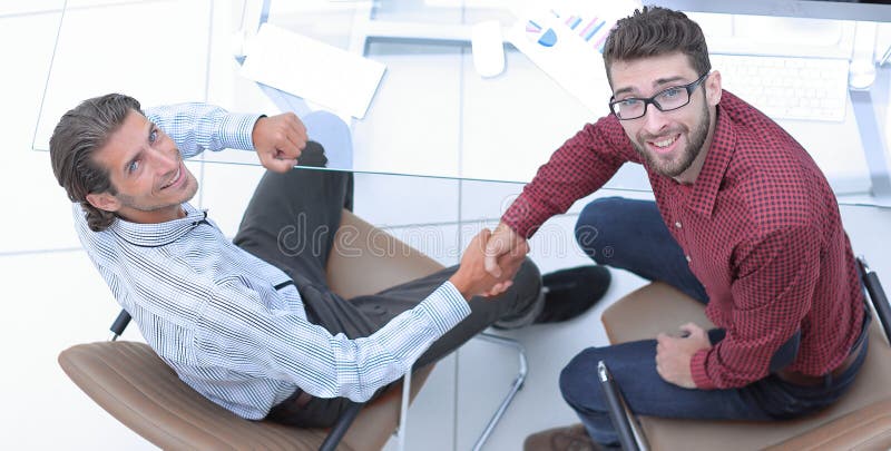 Handshake of the Staff Over a Desk Stock Image - Image of office, male ...