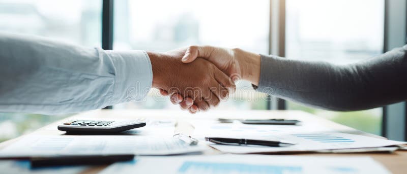 The Handshake Symbolizes a New Business Partnership in the Office ...