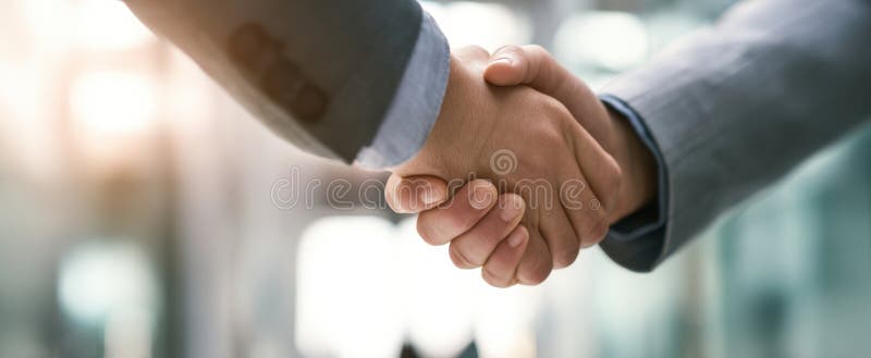 The Handshake Symbolizes Partnership and Collaboration in a ...