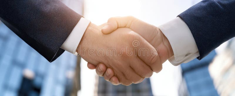 The Handshake Symbolizes Partnership and Collaboration in a ...