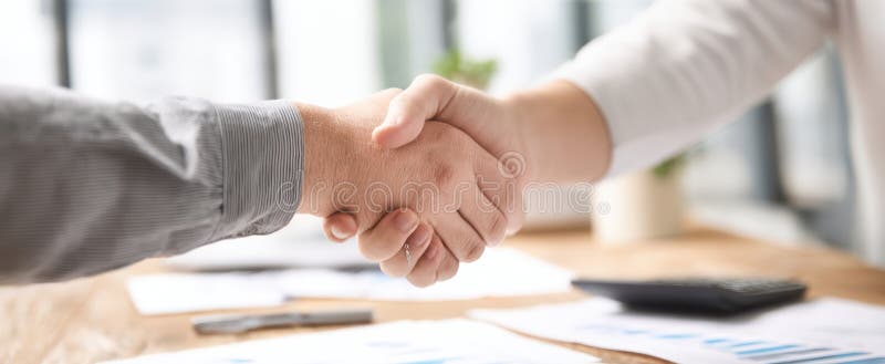 The Handshake Symbolizing Partnership and Commitment in a Professional ...