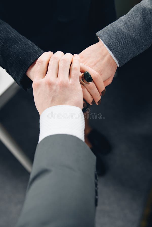 Handshake Three Hands of Businesspeople Stock Image - Image of ...