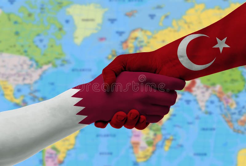 Handshake between Turkey and Qatar Flags Painted on Hands. Stock Photo ...