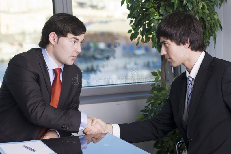 Handshake Between Two Businessmen Stock Photo - Image of harbour, deal ...