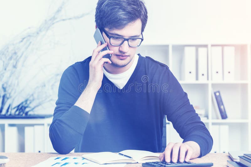 Young accountant on phone stock photo. Image of audit - 73784692
