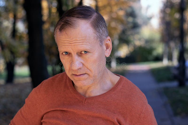 Handsome Active Mature Man 50-60 Years Old in a Bright Pullover Stock ...