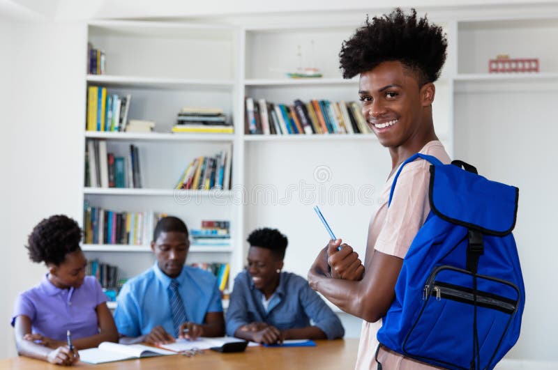 Handsome African Student at Classroom with Group of Young Adults Stock ...